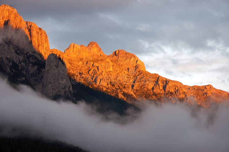 Alpine sunset. stock photo. Image of rocky, trees, cliff - 16806654
