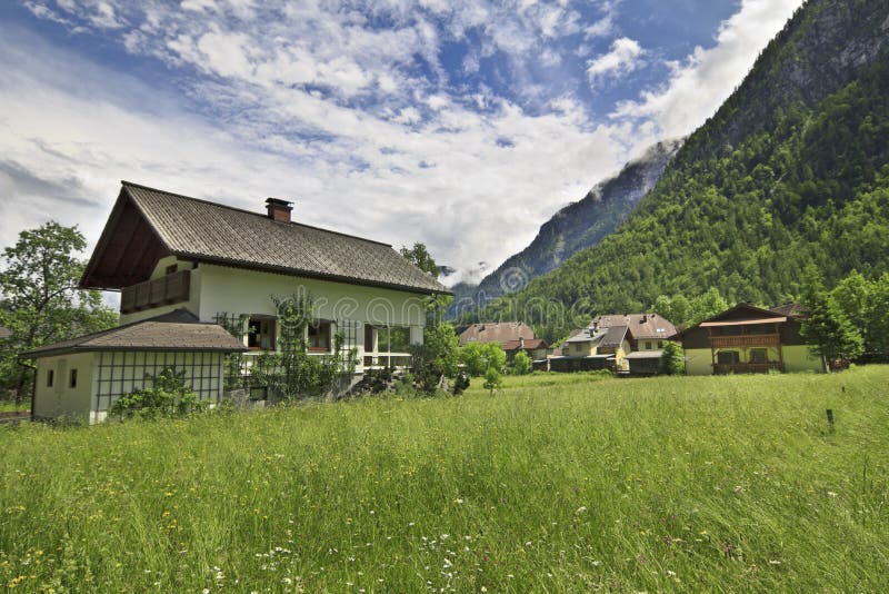 Alpine town stock image. Image of idyllic, trees, mountains - 24619279