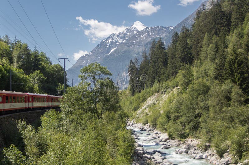 Alpine Train in the Swiss Alps Stock Photo - Image of outdoor, famous ...