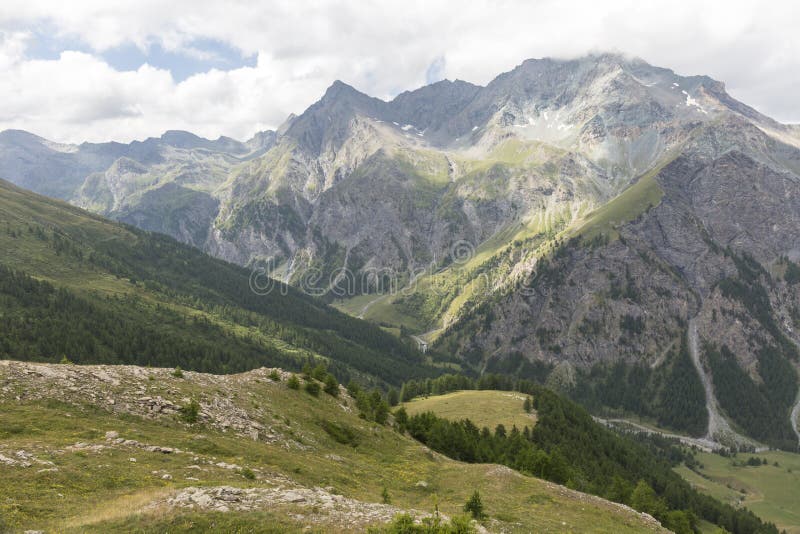 Alpine Valley stock image. Image of valley, clouds, landscapes - 87594407