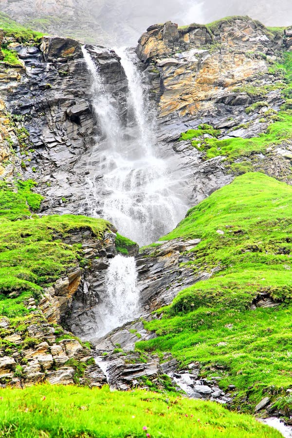 Alpine waterfall stock photo. Image of dull, natural - 49462486