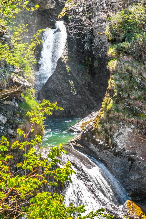 Alpine waterfalls stock photo. Image of view, alps, sunny - 131217800