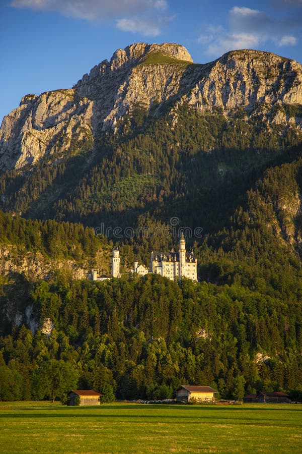 Neuschwanstein Castle with Alps in the Evening Light, Germany Editorial ...