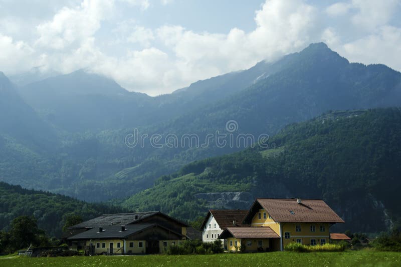 Alps farm in Austria stock image. Image of alps, clouds - 33153935