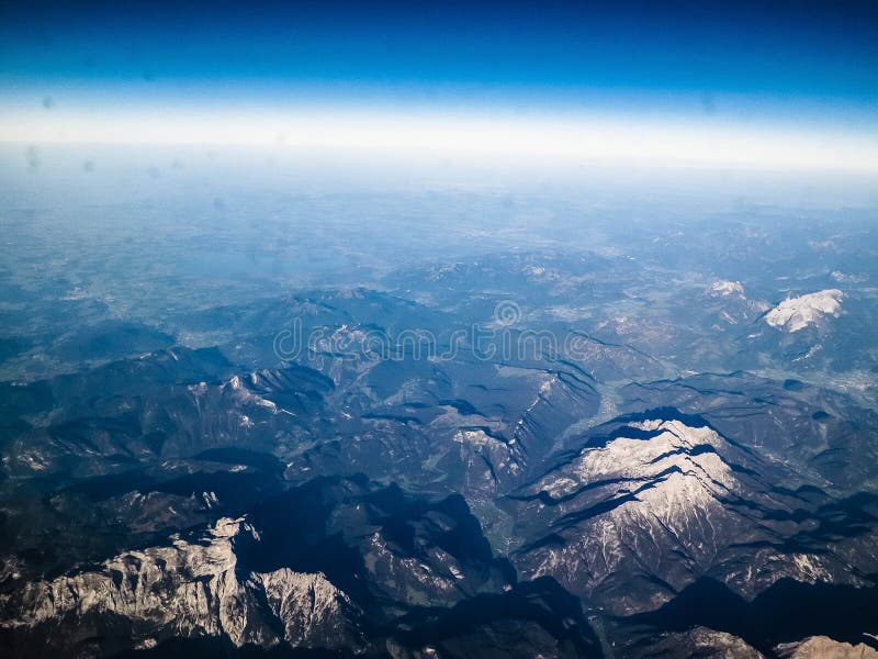 Alps from plane window stock image. Image of hill, europe - 299020137