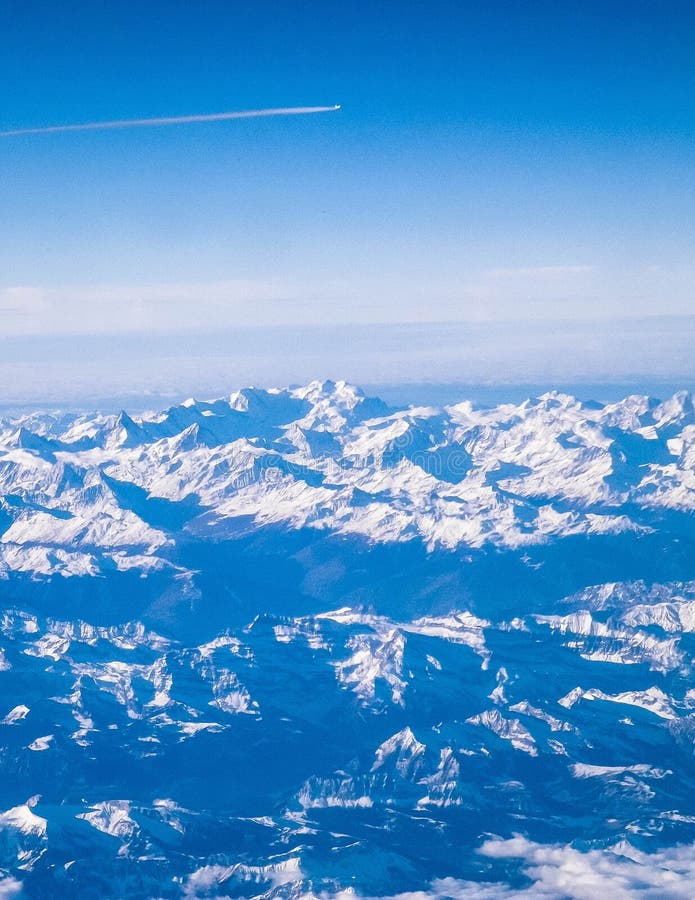 The Alps out of the plane stock image. Image of alpine - 49187383