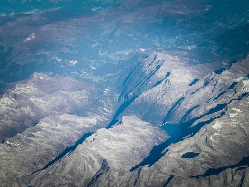 Alps from plane window stock photo. Image of europe - 264350866