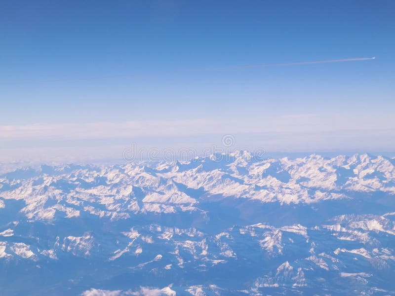 The Alps Seen from an Airplane Window Stock Photo - Image of ...