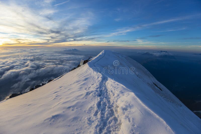 Alps at Sunset, Mountain Above the Clouds Stock Image - Image of ...