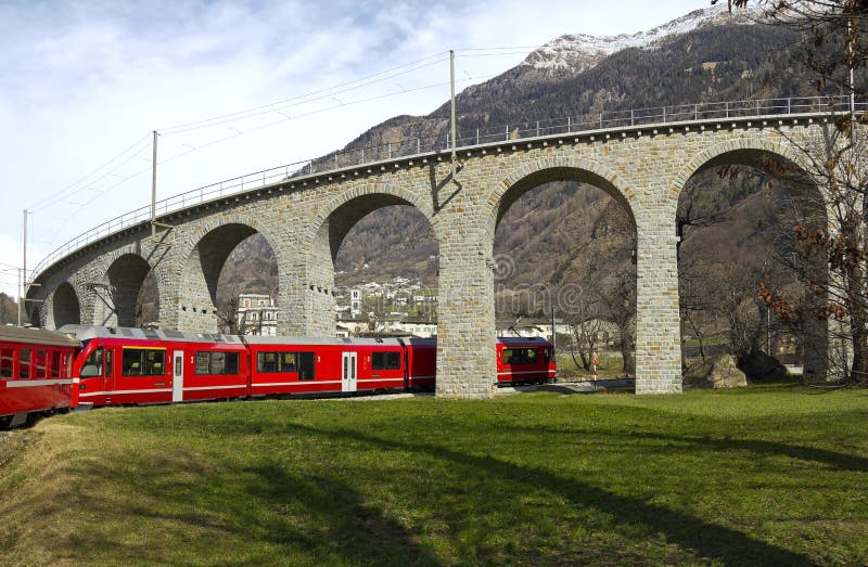 Alps Train Glides To Viaduct Stock Photo - Image of heritage, platform ...