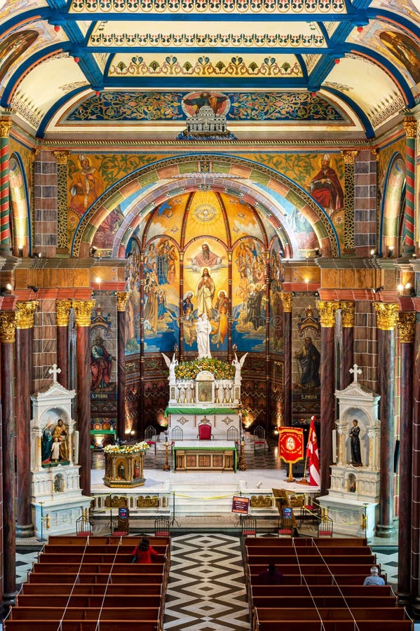 An Altar is Decorated with Religious Art and Decorative Artwork for a ...