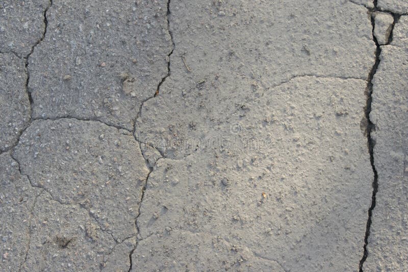 Alter Asphalt Mit Grauem Hintergrund Der Risse Stockfoto - Bild von ...