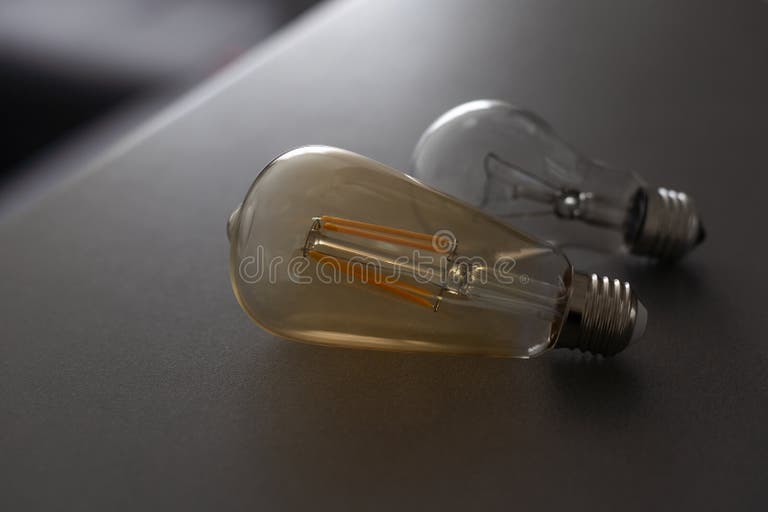 Alternative Technology Concept . Bulb and Fluorescent Bulb Comparing ...