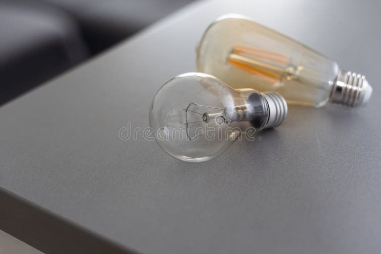 Alternative Technology Concept . Bulb and Fluorescent Bulb Comparing ...