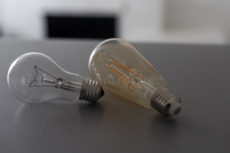 Alternative Technology Concept . Bulb and Fluorescent Bulb Comparing ...