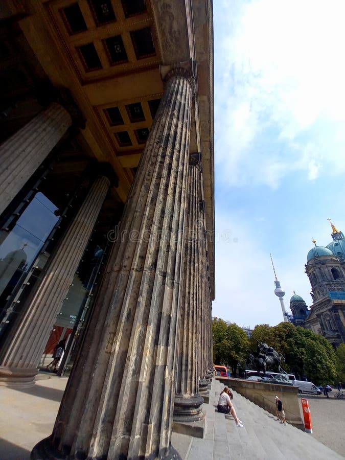 Altes Museum with Columns Towering Above. Statue with Male Figure on ...