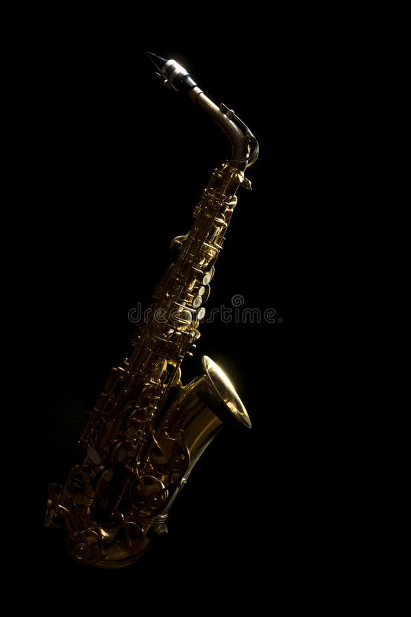 Alto saxophone in the dark stock photo. Image of close - 88198320