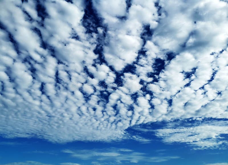Altocumulus and Cirrocumulus, Small Clouds Spread Across the Blue Sky ...