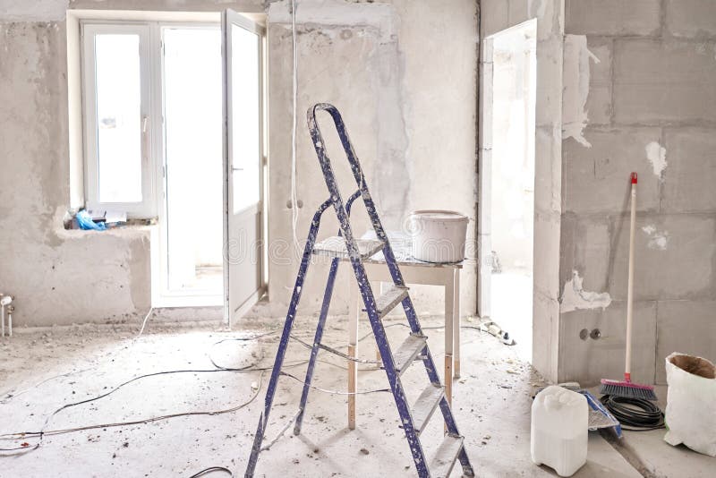 Aluminium Ladder in a Room Under Construction Works. Repair Process in ...