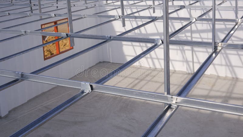 Aluminum C-line Ceiling Structure Over White Concrete Wall Inside of ...