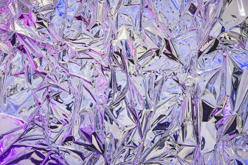 Aluminum Foil with Multi-colored Illumination . Background and Texture ...