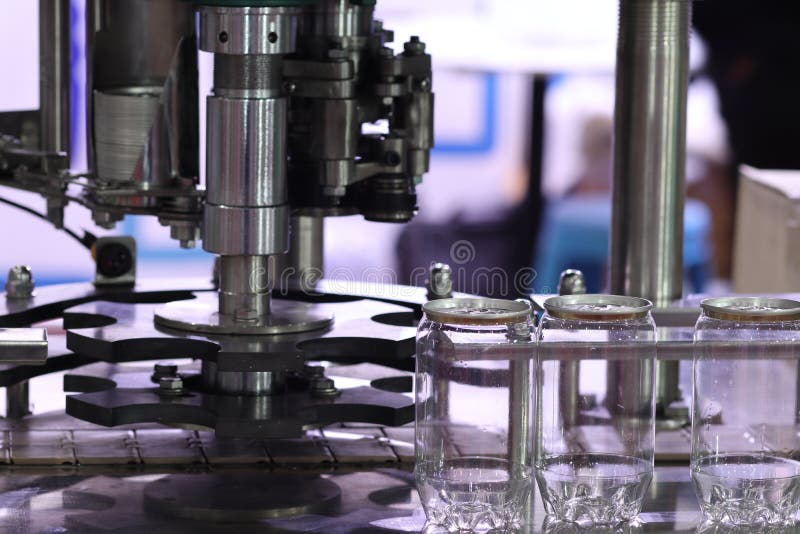 Aluminum Lid Packing Machine for Plastic Can Stock Photo - Image of ...