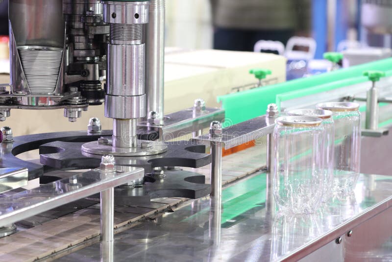 Aluminum Lid Packing Machine for Plastic Can Stock Photo - Image of ...