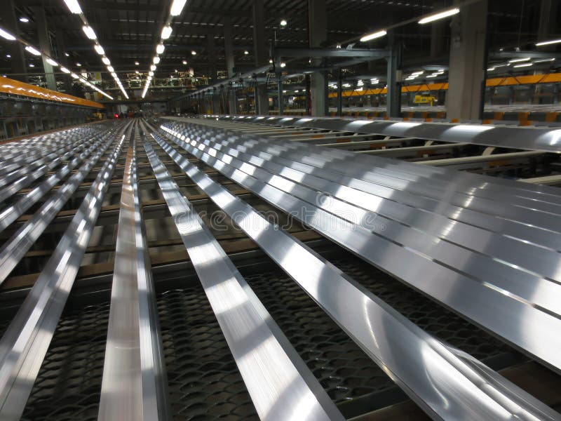 Aluminum Lines on a Conveyor Belt Stock Photo - Image of profiles ...