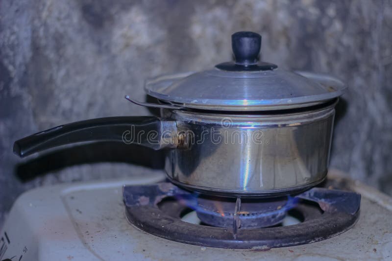 An Aluminum Pot is Placed on the Stove Stock Photo - Image of ceramic ...