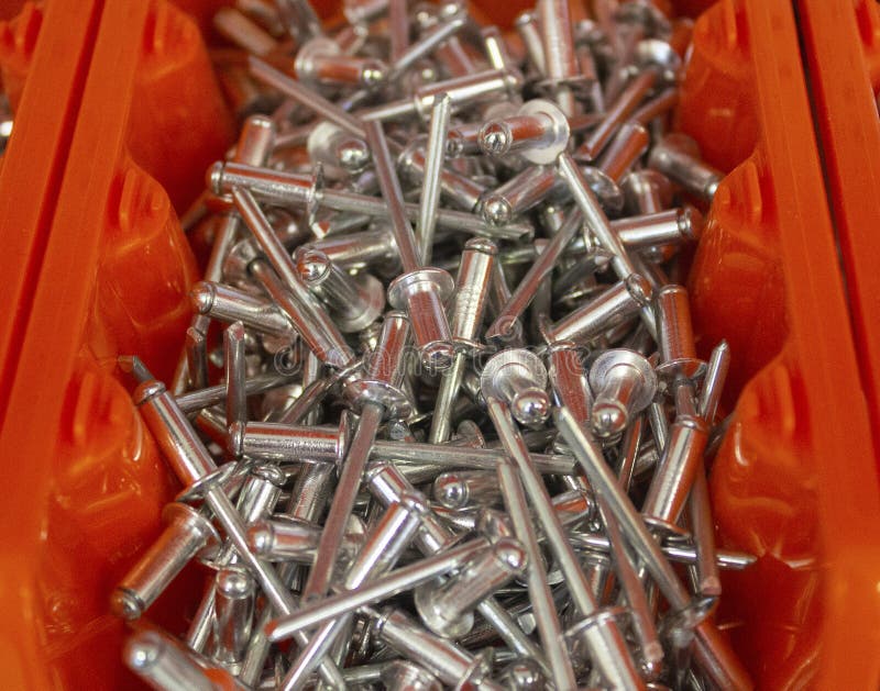 Aluminum rivets in the box stock photo. Image of market - 140510208