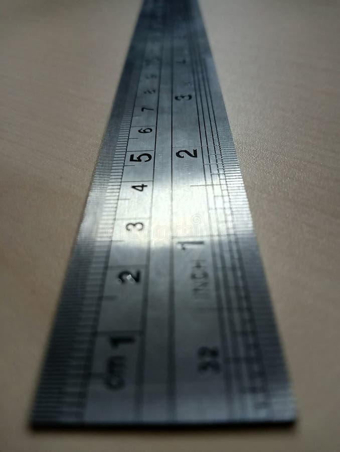 Aluminum Ruler on the Table Stock Photo - Image of 12345, ruler: 277749618