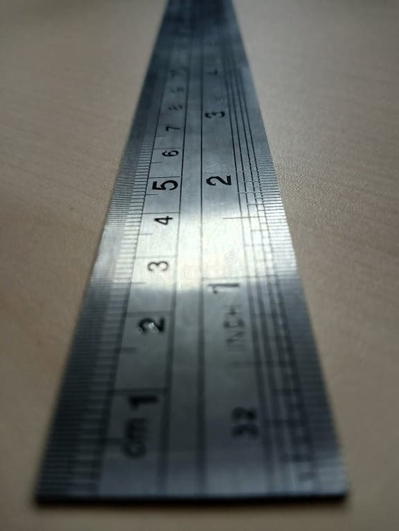 Aluminum Ruler on the Table Stock Photo - Image of 12345, ruler: 277749618