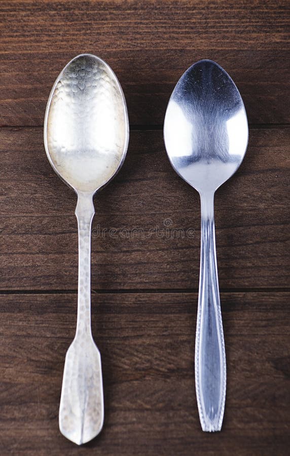 Aluminum Spoons Laying on Wooden Table Stock Image - Image of laying ...