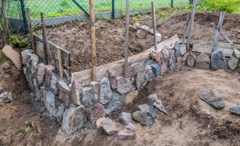 Amateur Construction Site of a Stone Retaining Wall Made of Field ...