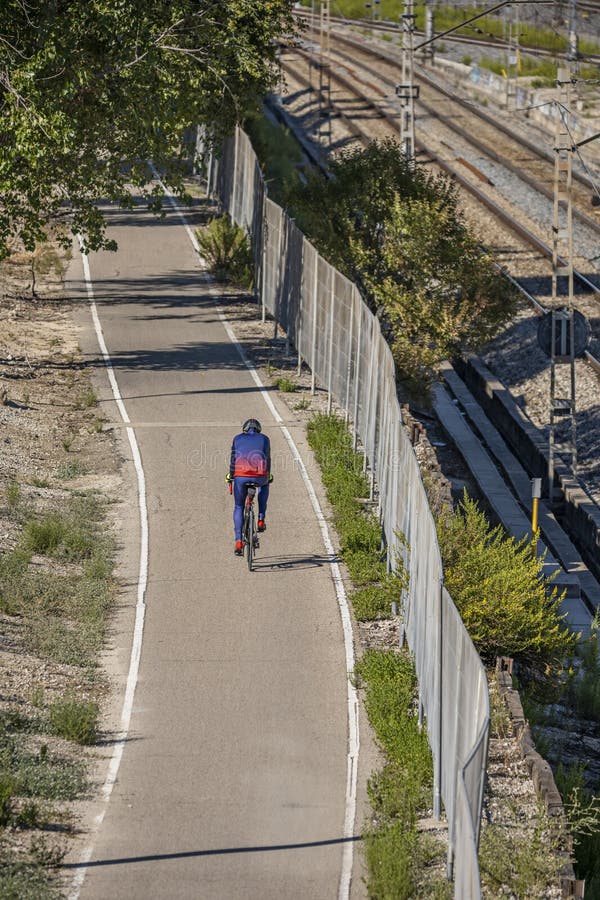An Amateur Cyclist Doing His Sporting Route on a Bike Path Stock Photo ...