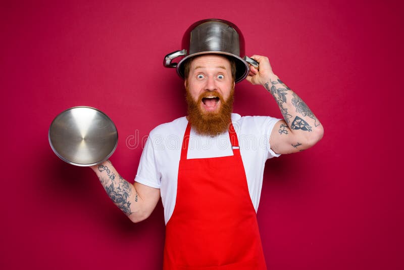 Amazed Chef with Beard and Red Apron Plays with Pot Stock Photo - Image ...