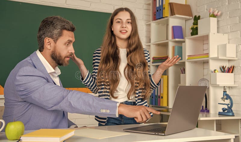 Amazed Child with Man Teacher in Classroom. Education Stock Photo ...
