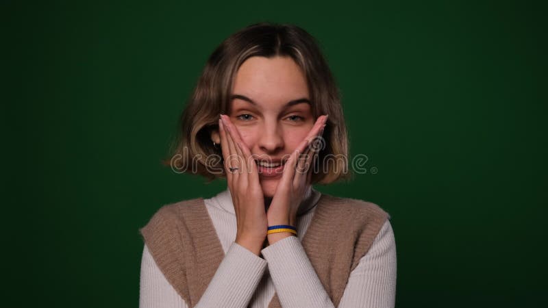 Amazed Excited Young Woman Hands In Surprise Looking At Camera With Big