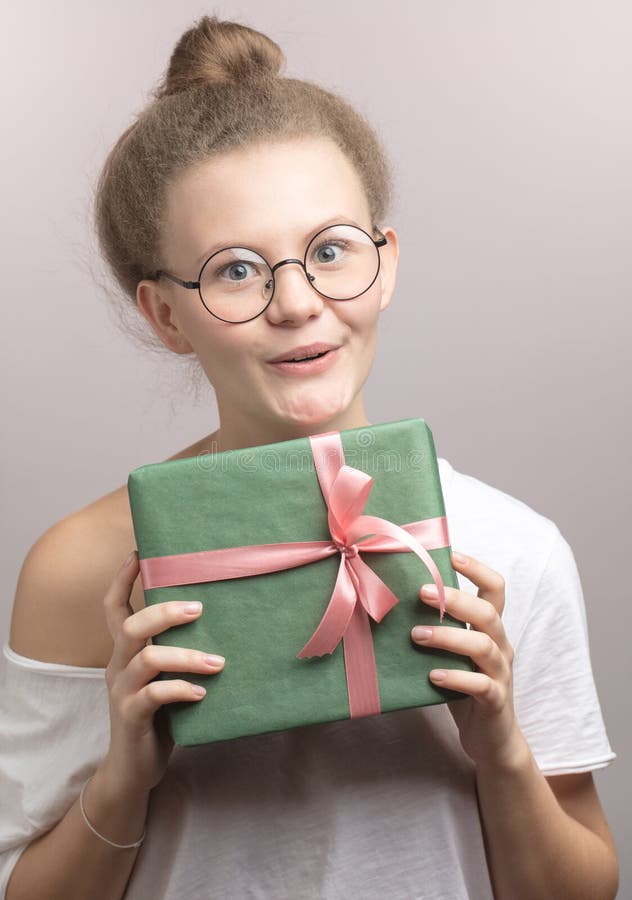 Amazed Girl in Glasses with Modest Gift Stock Image - Image of glasses ...