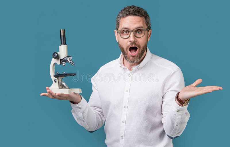 Amazed Man Microscope for Invention. Photo of Man Holding Microscope ...