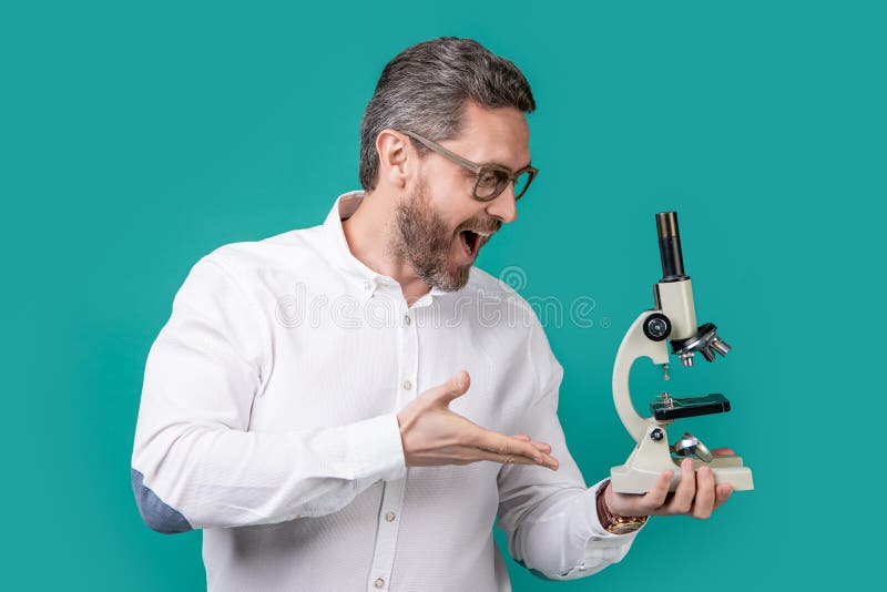 Amazed Man Microscope for Invention. Photo of Man Holding Microscope ...