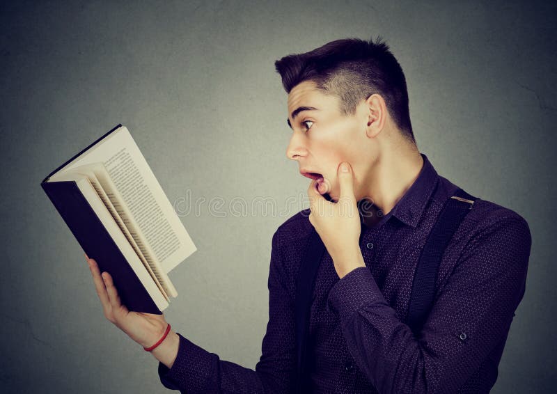 Shocked Man Reading Message on Computer in Office Stock Photo - Image ...