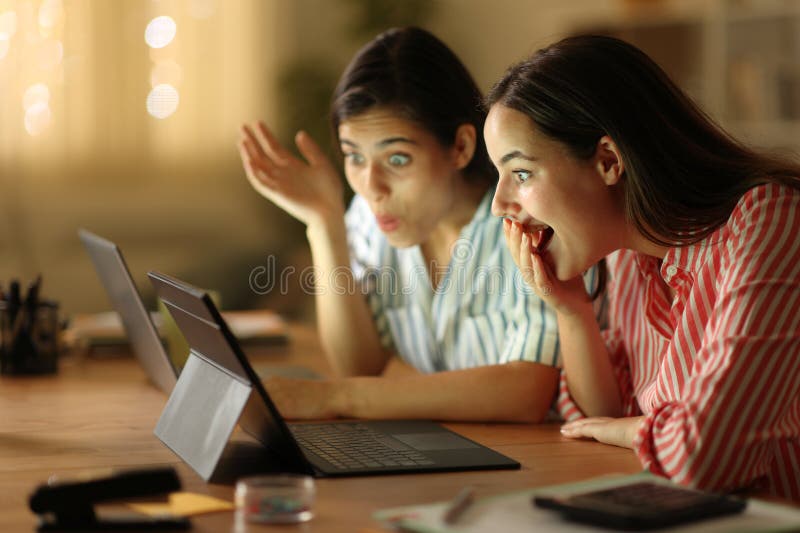 Amazed Tele Workers Checking Laptop in the Night Stock Photo - Image of ...