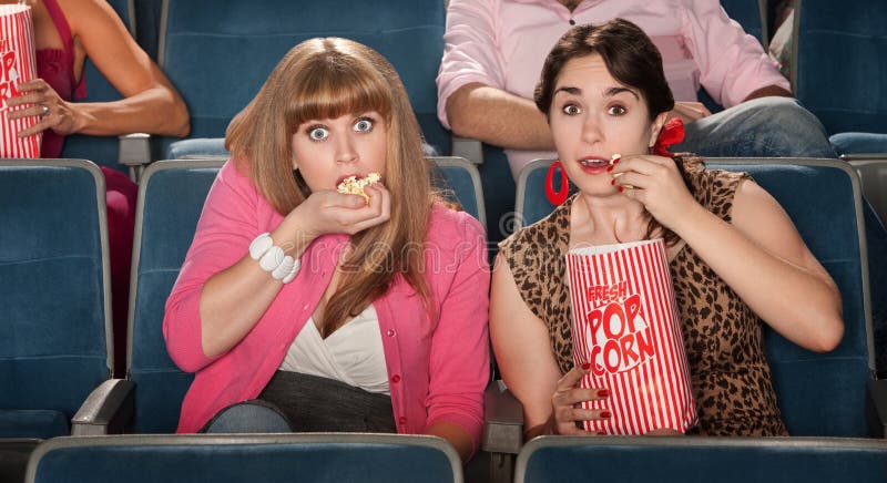 Amazed Women Eating Popcorn Stock Photo - Image of leopard, anxious ...