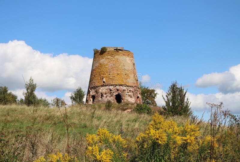 Amazing abandoned windmill stock image. Image of brick - 343117411