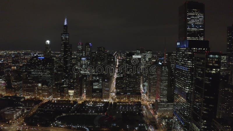 Amazing Drone Footage Of Downtown Chicago Skyline At Night Stock