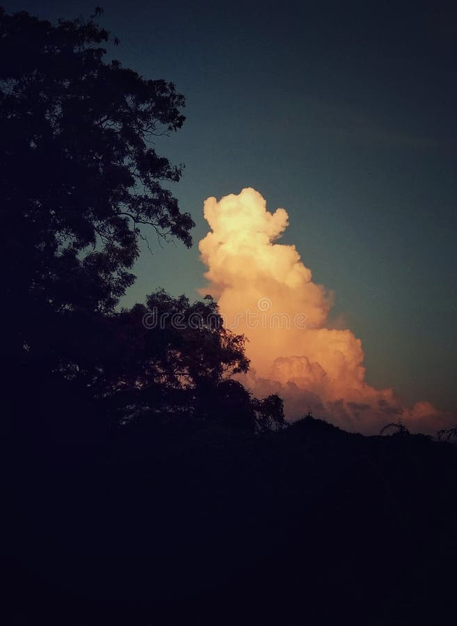 Amazing cloud stock image. Image of sunlight, tree, glow - 136130443
