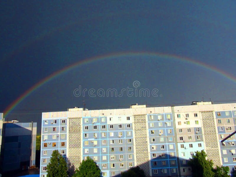 A Multi-colored Rainbow that Creates a Sky Bridge Against the ...