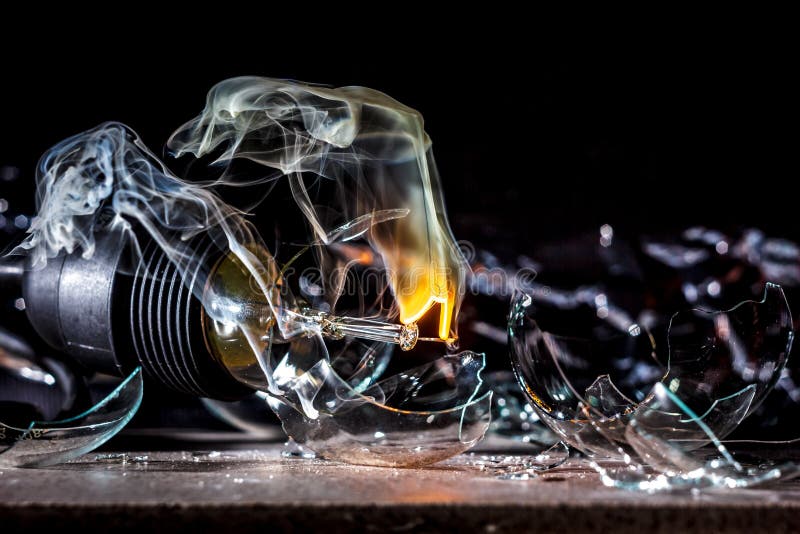 Amazing Explosion of a Burning Light Bulb with Splinters and Smoke ...
