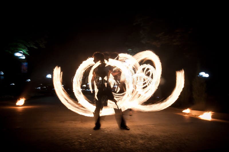 Amazing Fire Show Dance. Fire Dancer Playing with Flame Editorial Image ...